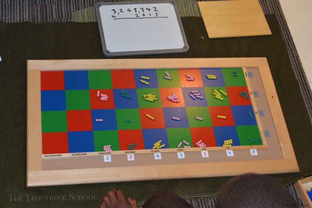4 digit multiplication using the Montessori checker board | The ...